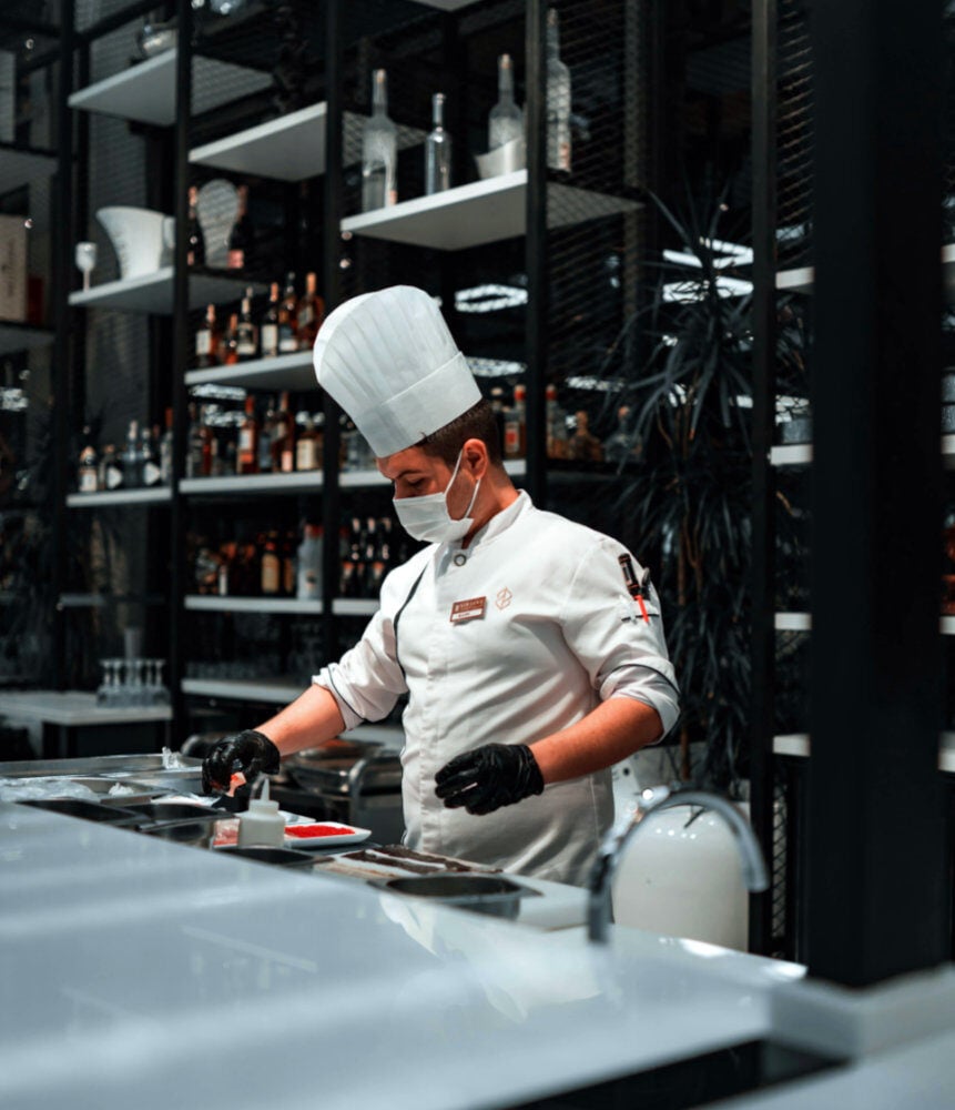 Why Do Chefs Wear White? - EHL Insights | Culinary Arts